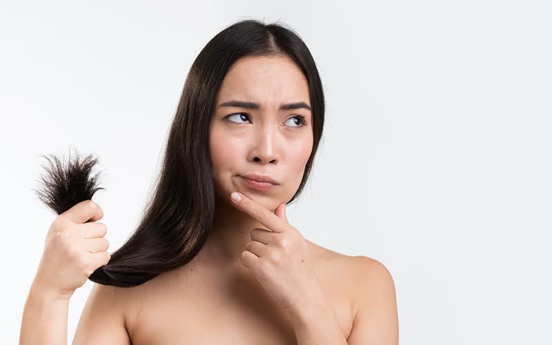 An Expert Guide to Applying Hair Oil for Frizzy Hair in Singapore